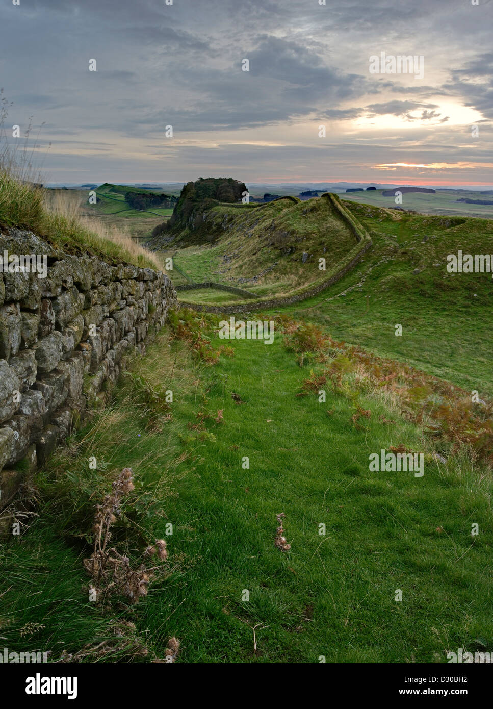 The Roman Wall at dawn looking towards the rising sun in the East near ...