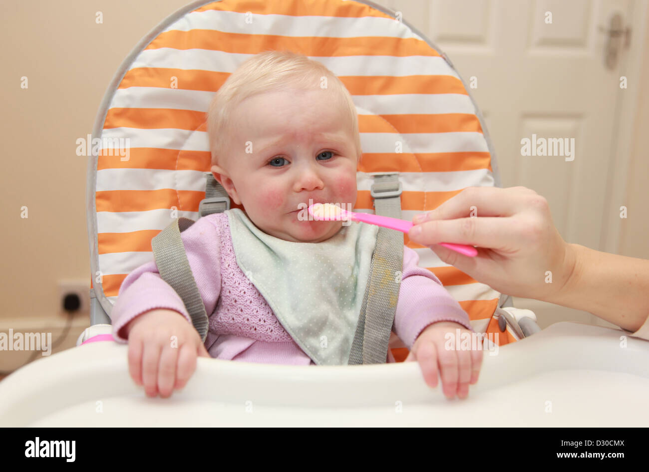 Baby refusing to eat Stock Photo - Alamy