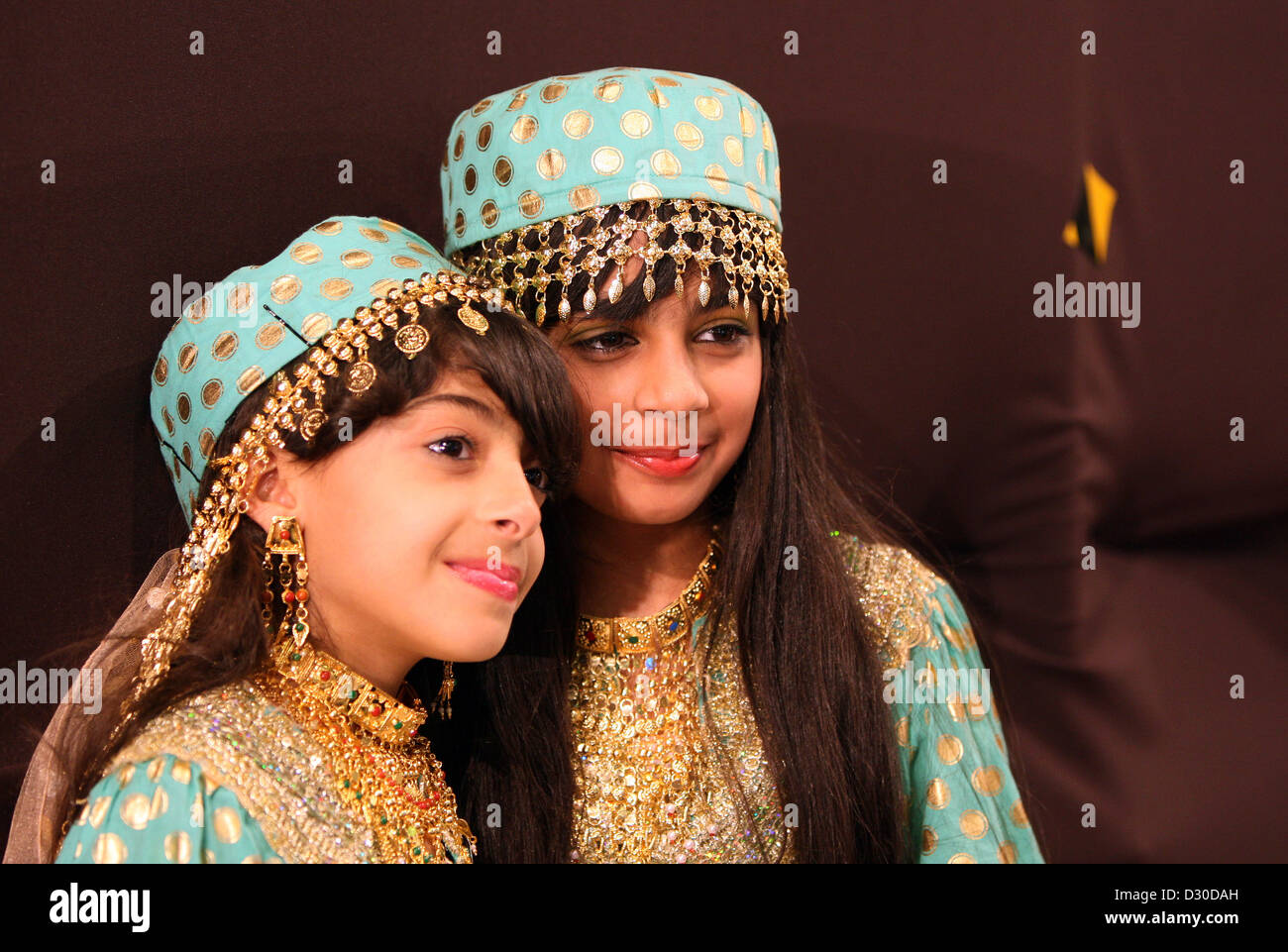 Dubai, United Arab Emirates, girls in festive robes in portrait Stock ...