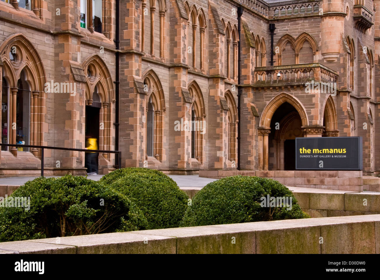 A visitor entering the main doors of the “McManus Museum & Art Gallery” in Dundee,UK Stock Photo ...