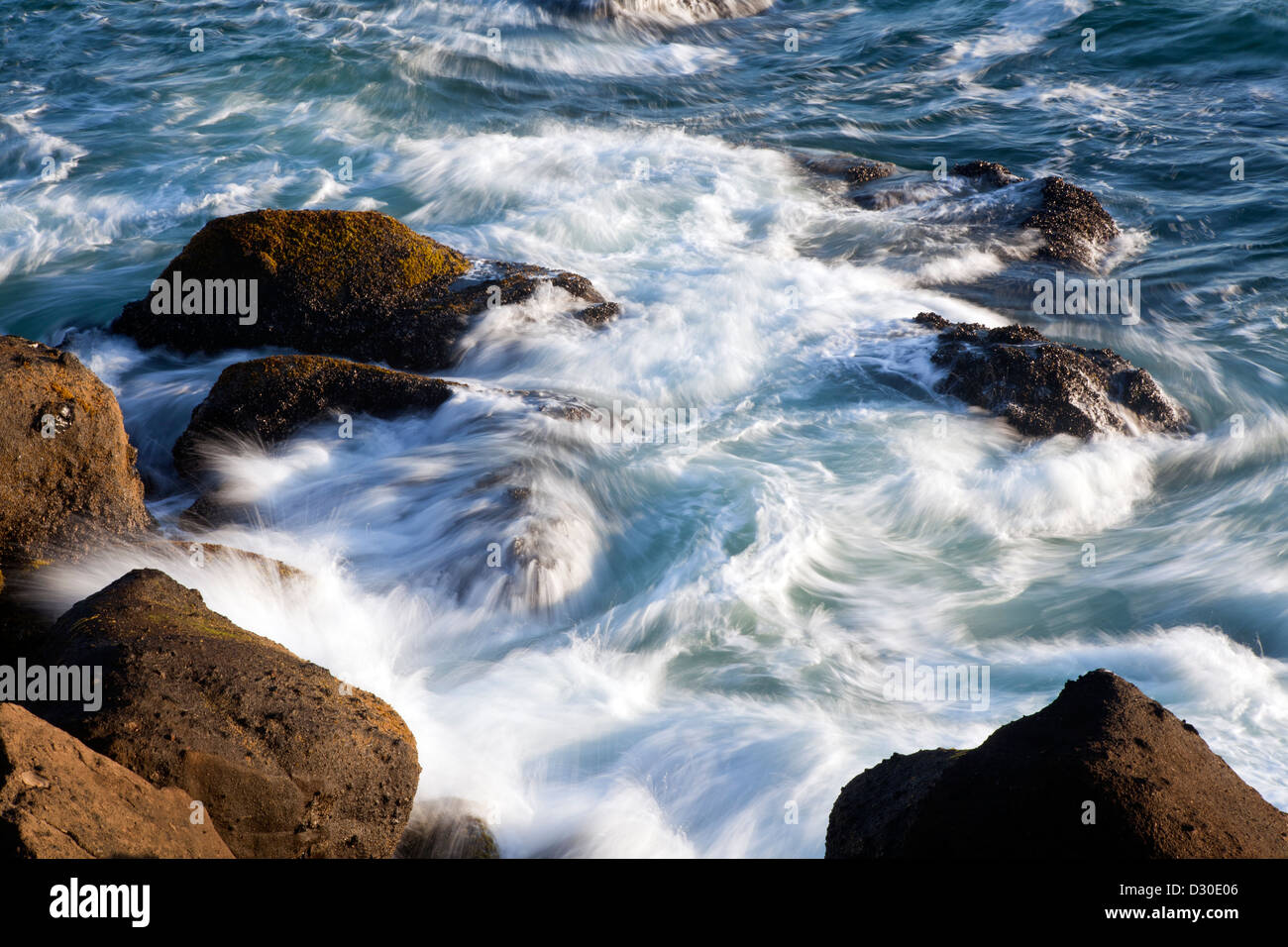 OR00927-00...OREGON - Surging surf at Indian Point in Ecola State Park ...