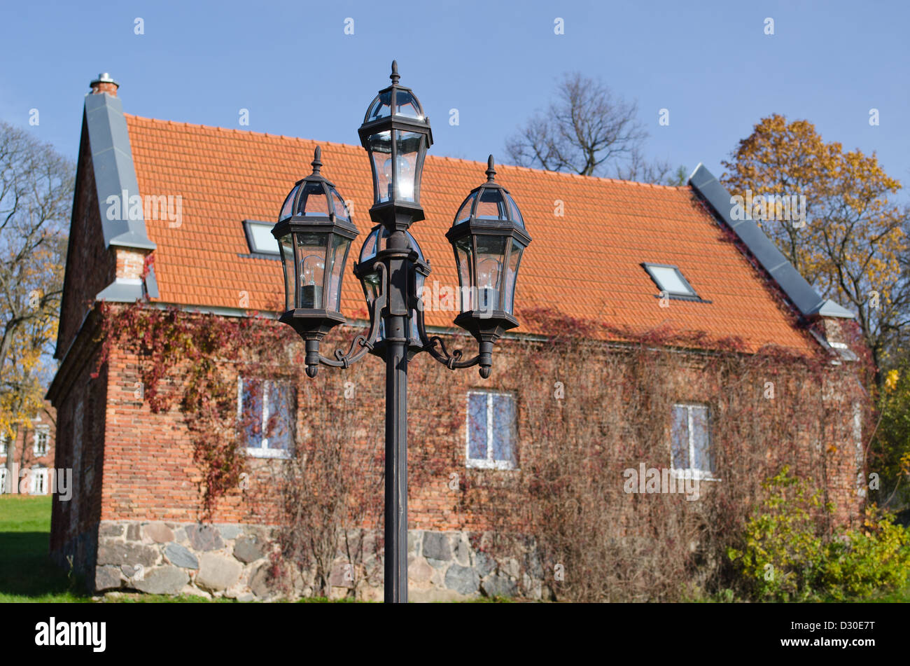 old retro steel lighting pole with four heads in park and renew ...