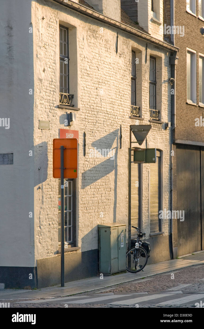 Magic hour street corner scene in Bruges Belgium Stock Photo - Alamy