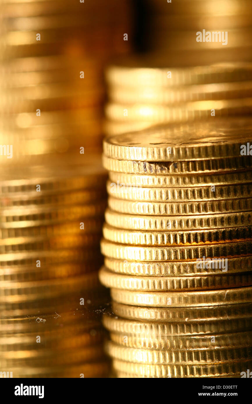 golden piles of coins macro background Stock Photo - Alamy