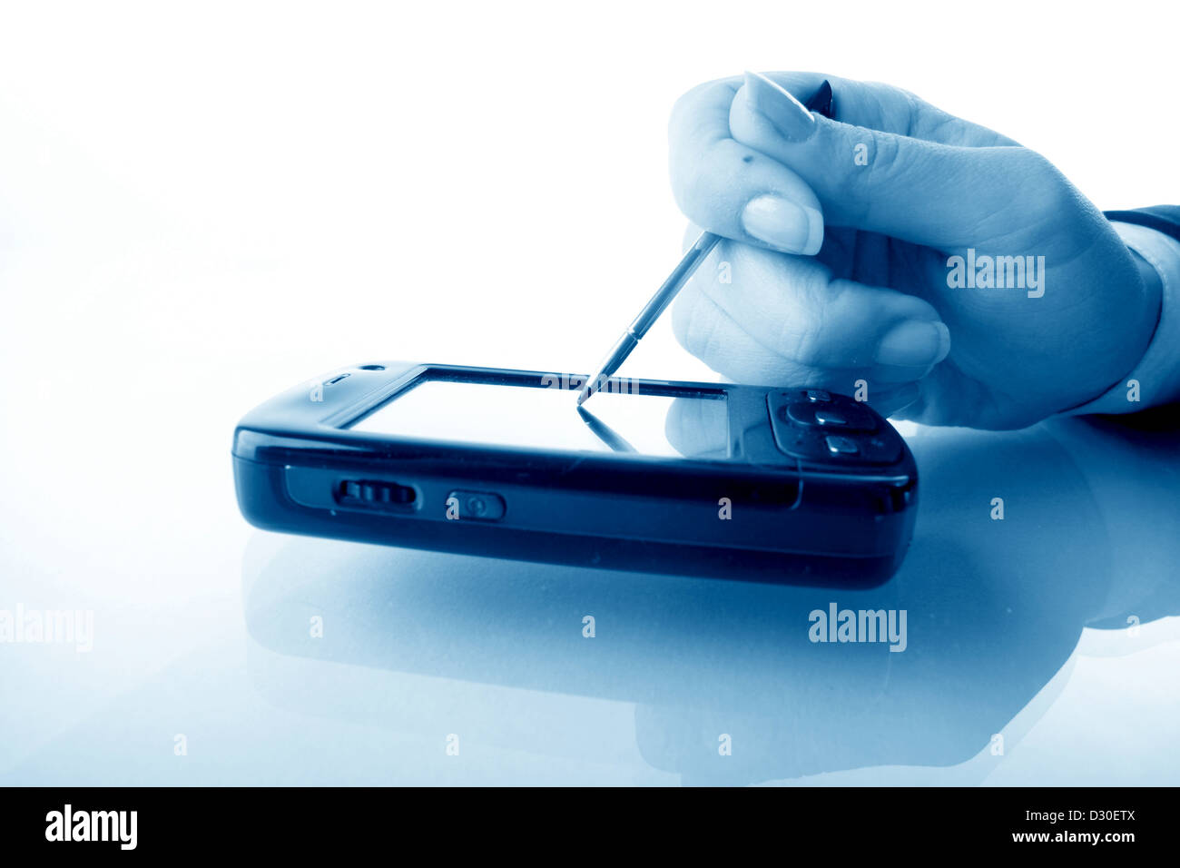 girl hand work on communicator Stock Photo - Alamy