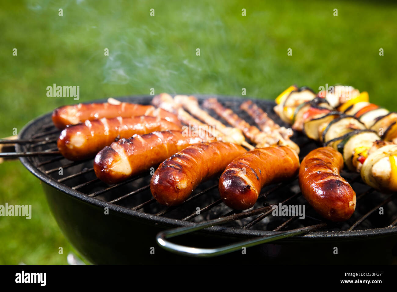 Barbecue a hot summer evening, Grilling Stock Photo - Alamy
