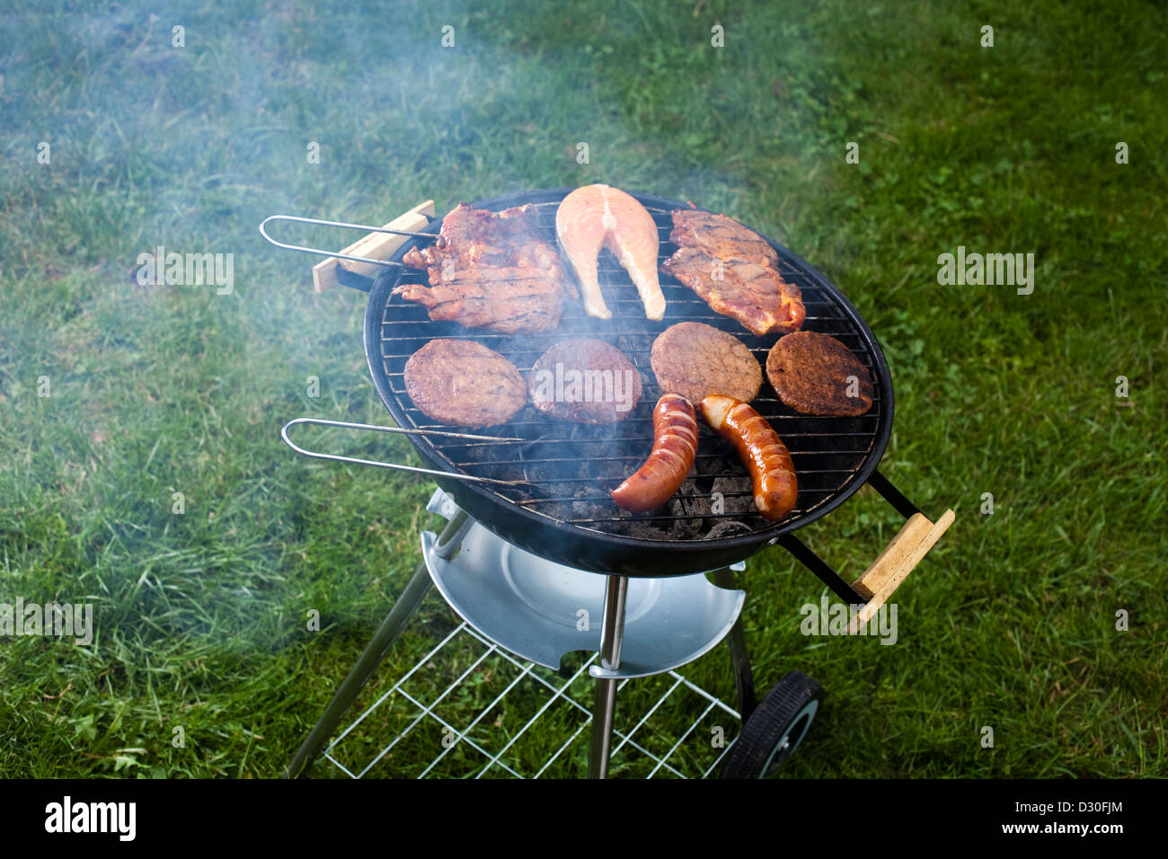BBQ, Grilling time Stock Photo - Alamy