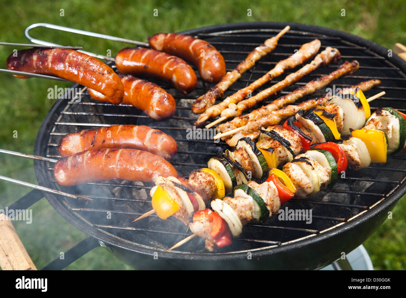 Barbecue a hot summer evening, Grilling Stock Photo - Alamy