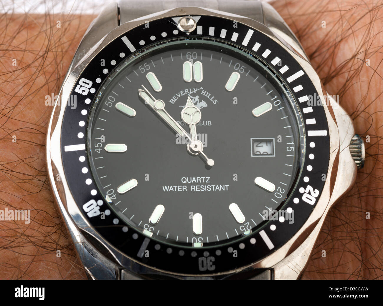 Close-up of a watch on a man's wrist Stock Photo - Alamy