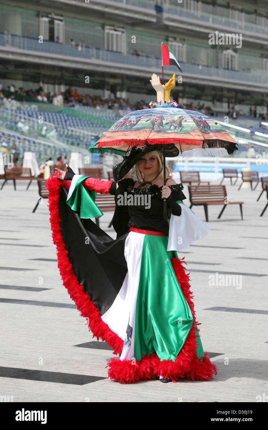Dubai, United Arab Emirates, woman wears a dress in the national colors ...