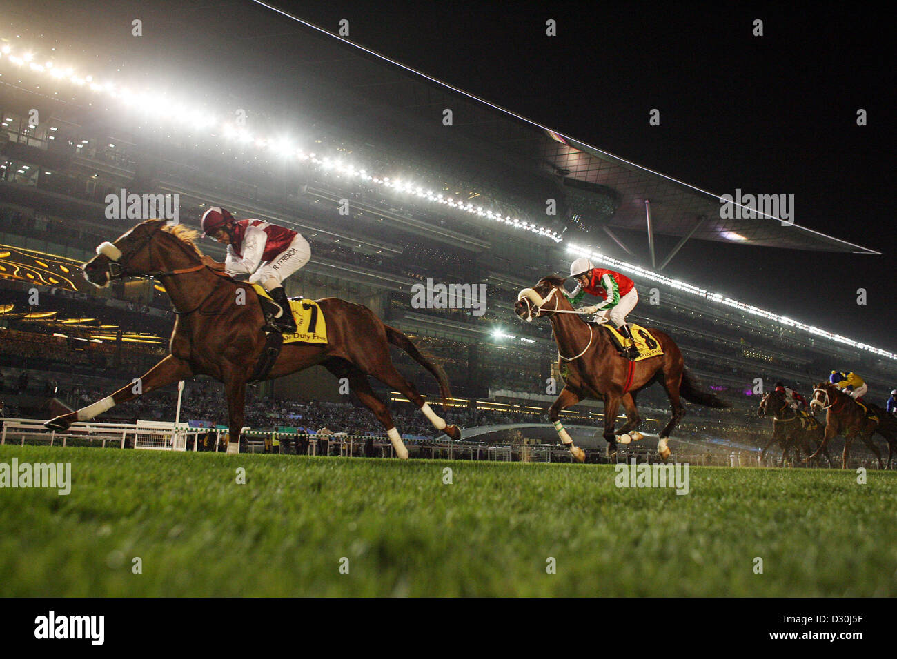 Dubai, United Arab Emirates, horses and jockeys on the racecourse ...