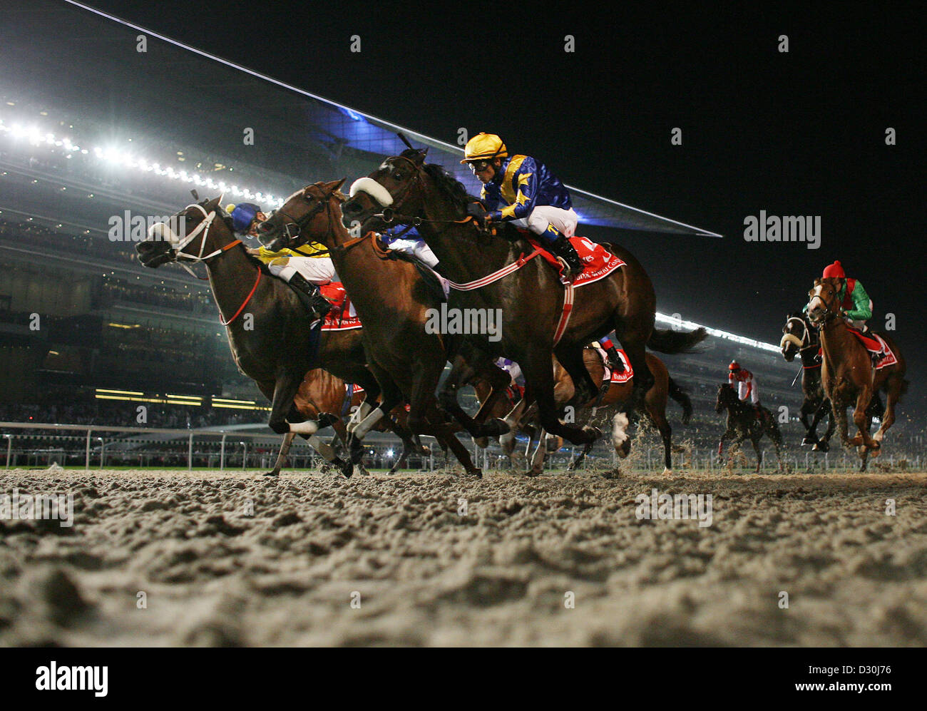 Dubai, United Arab Emirates, horses and jockeys on the racecourse ...