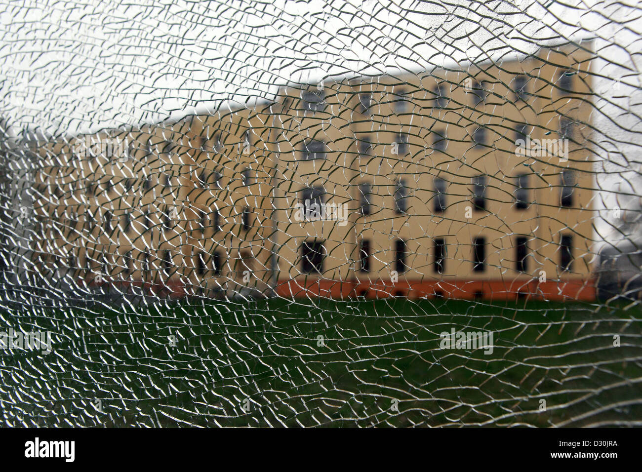 Berlin, Germany, house facade behind a cracked window pane Stock Photo ...