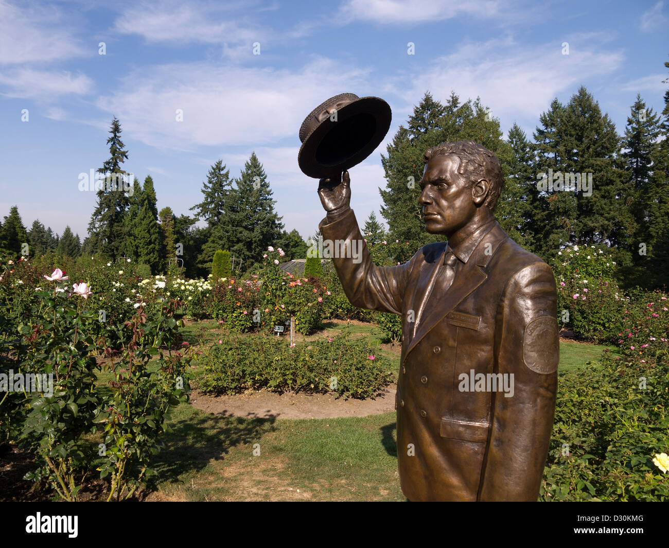 A Statue of a Royal Rosarian, or greeter, tips his hat in International ...