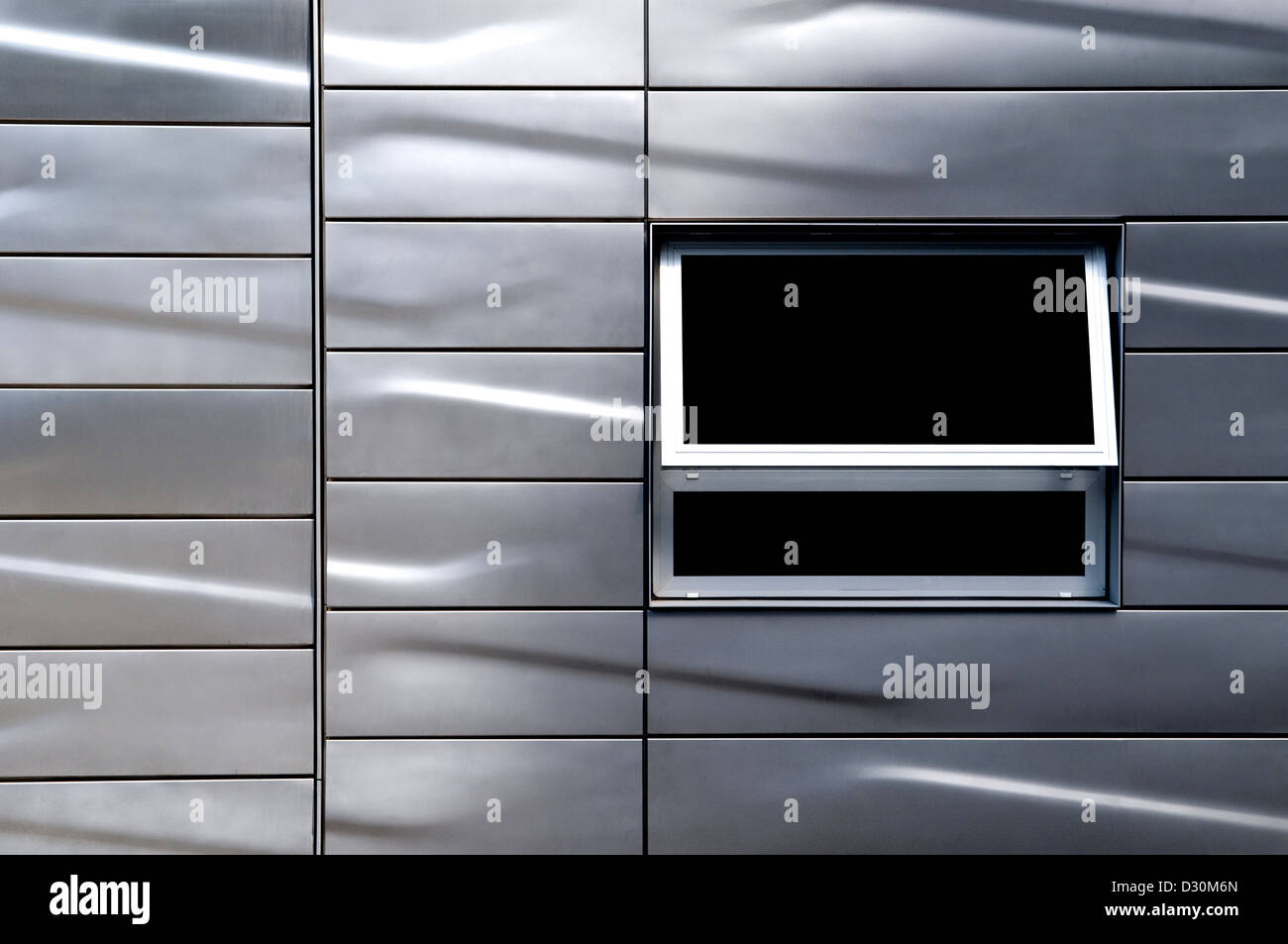 A modern window and metallic building facade Stock Photo - Alamy