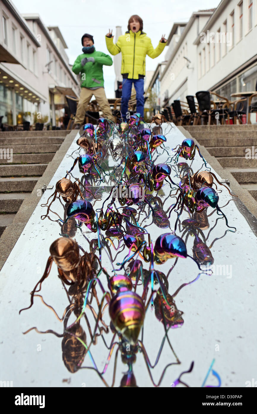Kassel, Germany, children are screaming in glittering steel ants Stock ...
