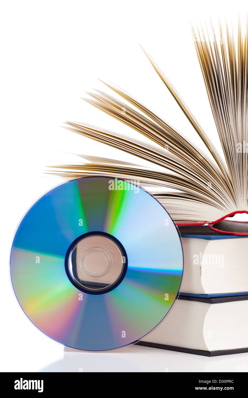 Book with compact disc over white background - e-book or digital ...
