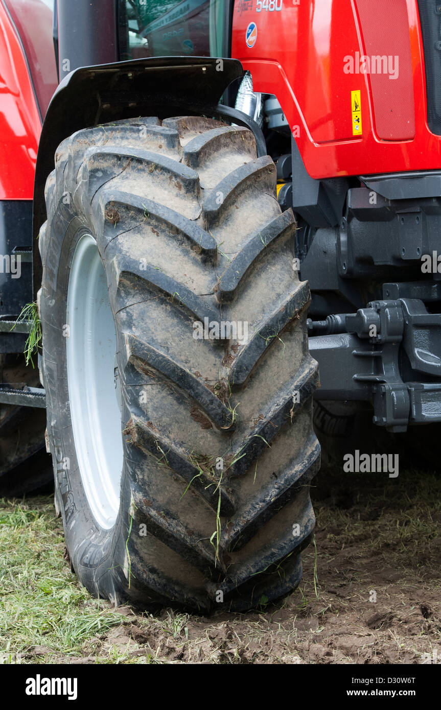 Front wheel on a massey Ferguson tractor Stock Photo - Alamy