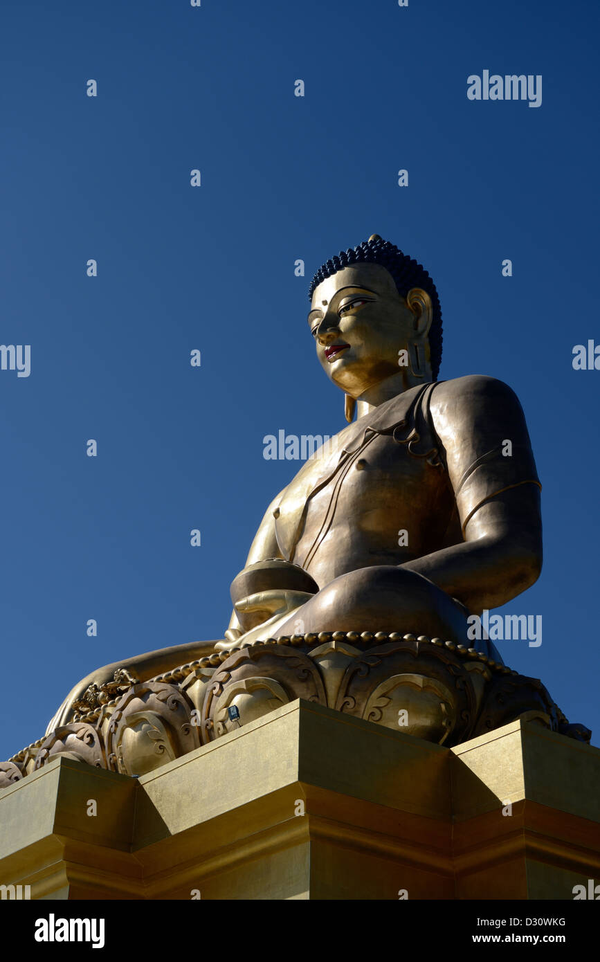 Giant golden Buddha statue,overlooks the valley with the capital ...