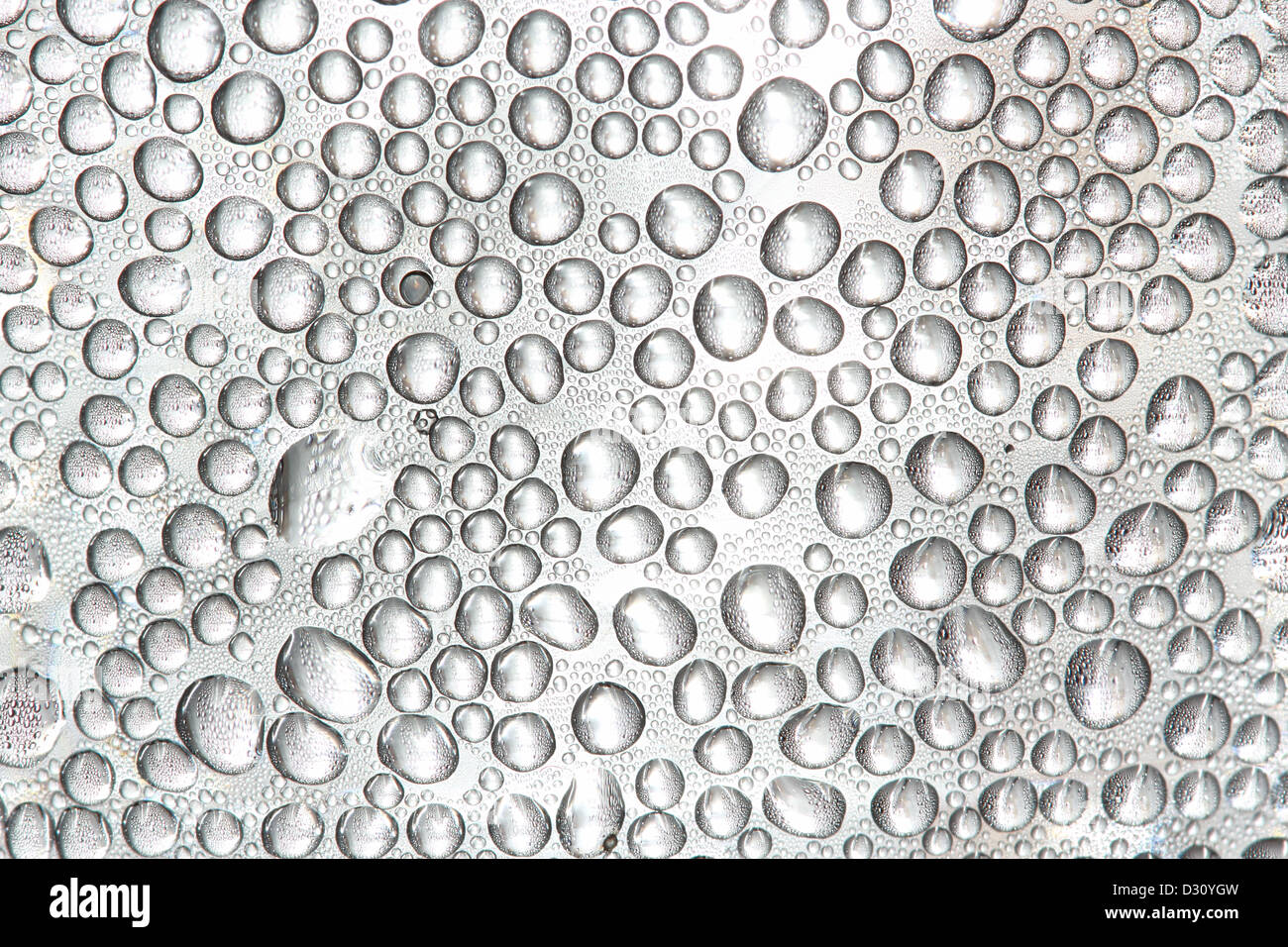group of drop of water on glass surface Stock Photo - Alamy