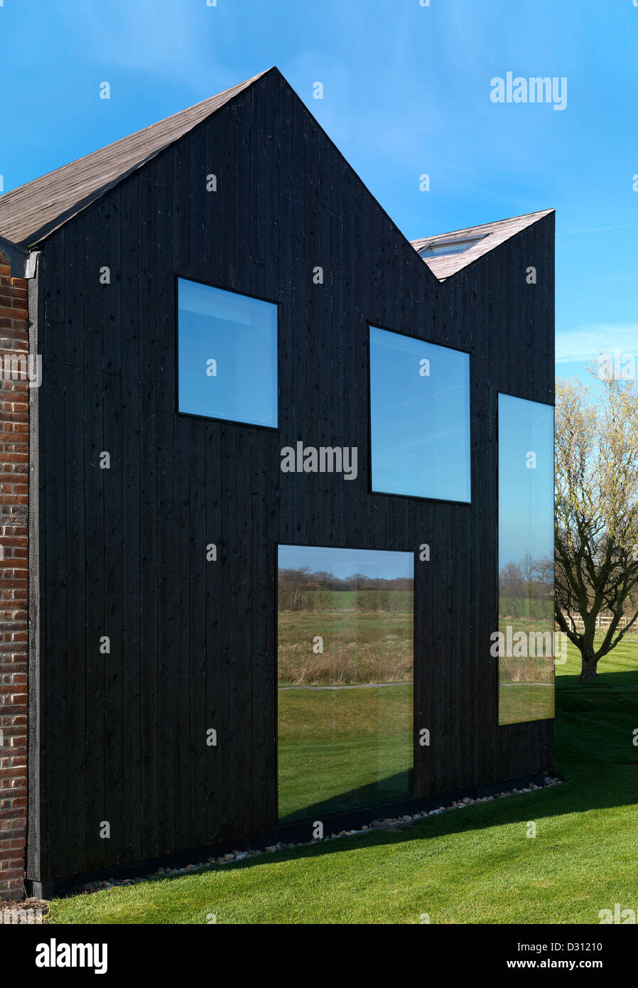 Hunsett Mill, Stalham, United Kingdom. Architect: ACME, 2010. Rear ...