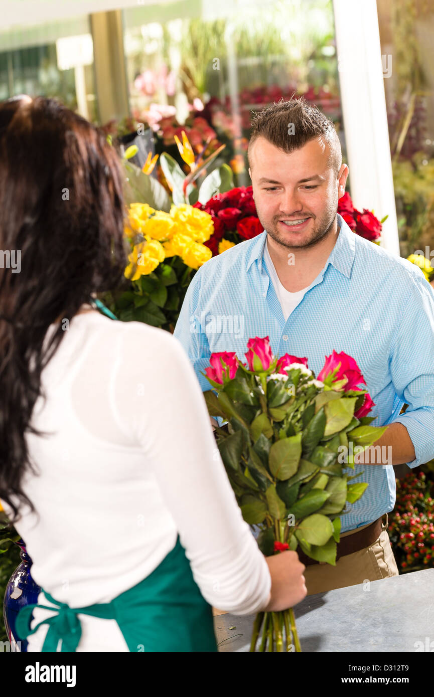 Husband buying roses bouquet romantic flower market florist Stock Photo ...