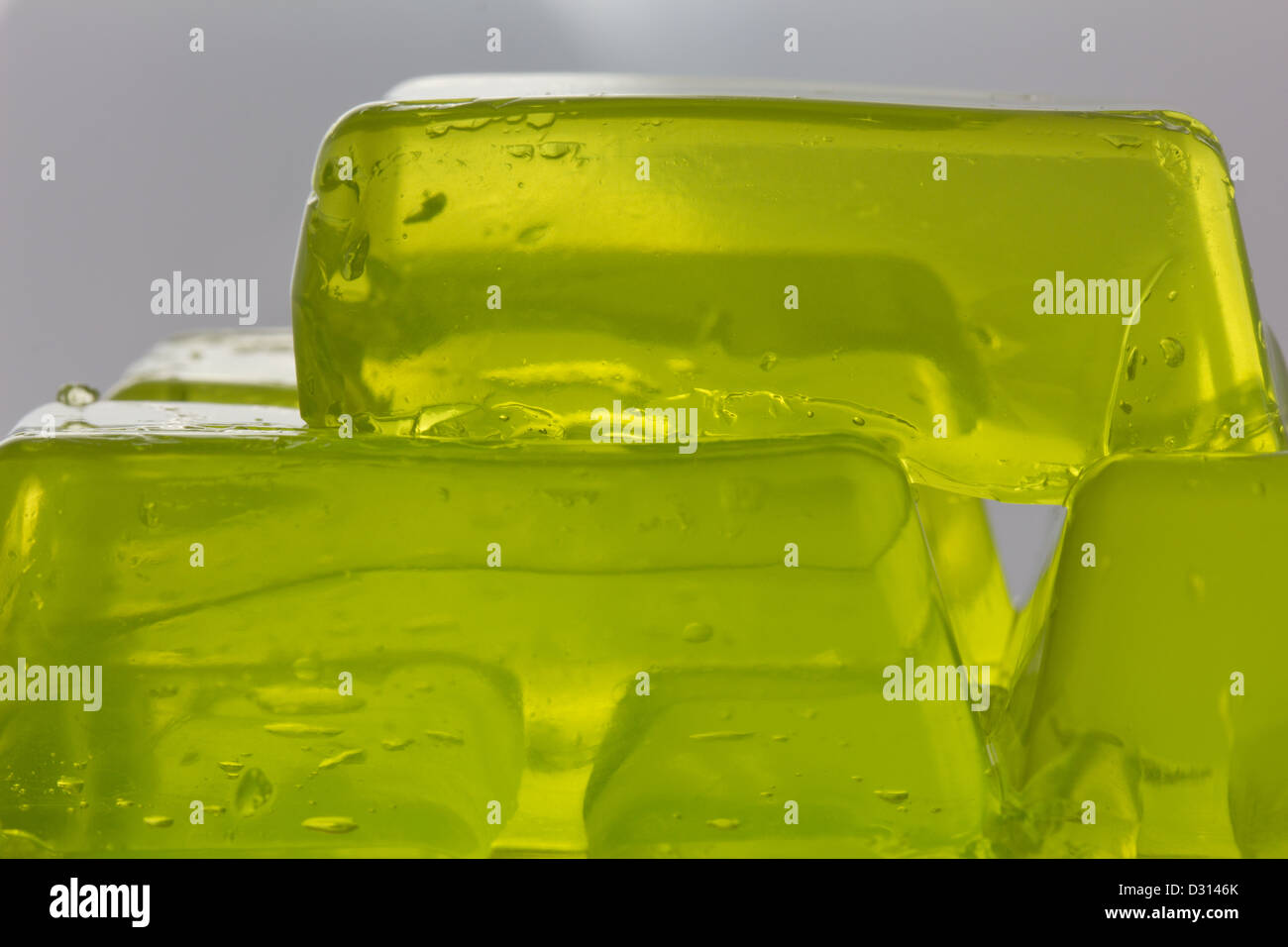 Stacked green jelly 'bricks' Stock Photo - Alamy