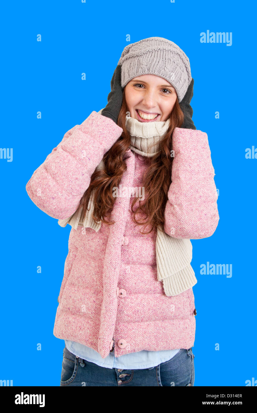 Young woman wearing warm winter clothes in studio Stock Photo - Alamy
