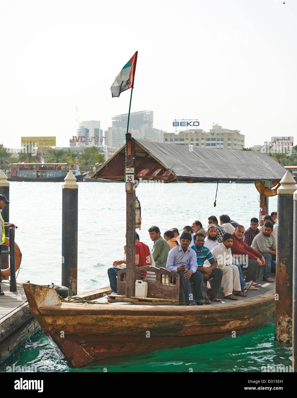 Compact wooden ferry boats shuttle passengers down the Dubai Creek ...