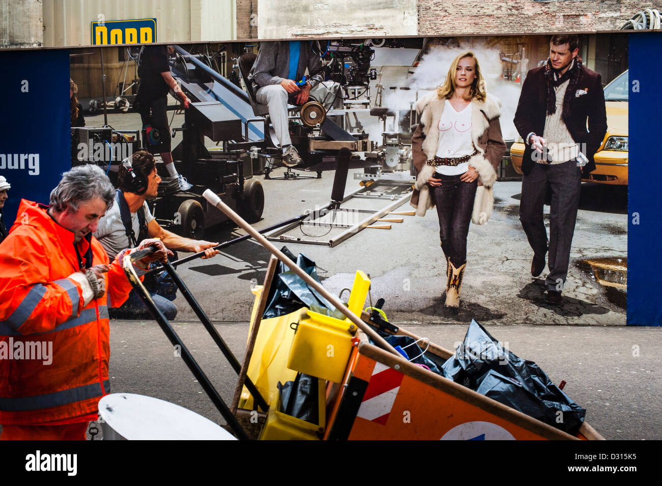 Garbage man and advertisement poster in Vienna Stock Photo - Alamy
