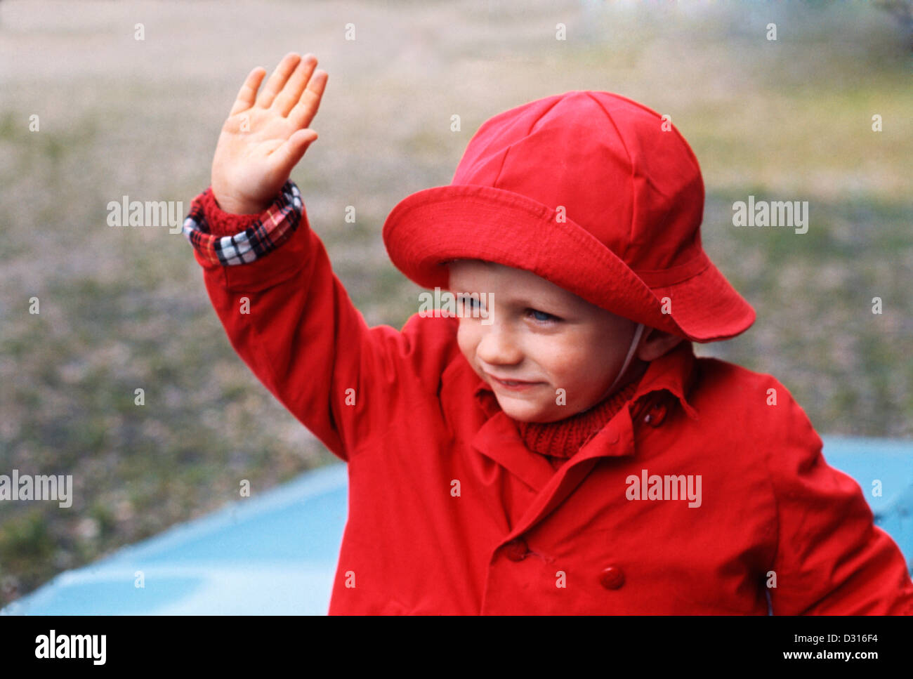 Small boy waving good-bye Stock Photo - Alamy