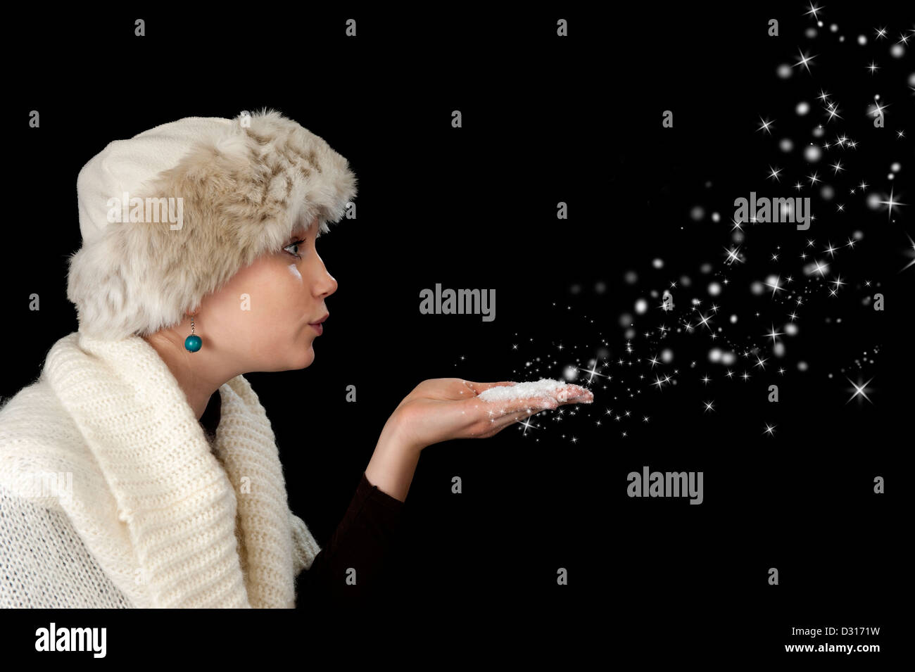 profile of a young woman blowing snow Stock Photo - Alamy