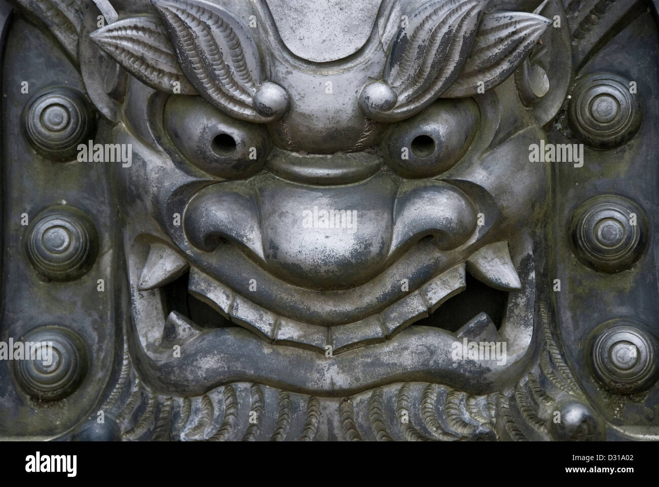 A carving of a demon, protecting the zen Buddhist temple of Tenryu-ji ...