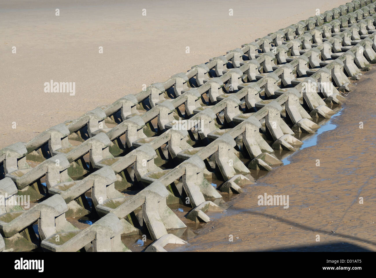 Concrete groynes on New Brighton beach on the Wirral Stock Photo - Alamy