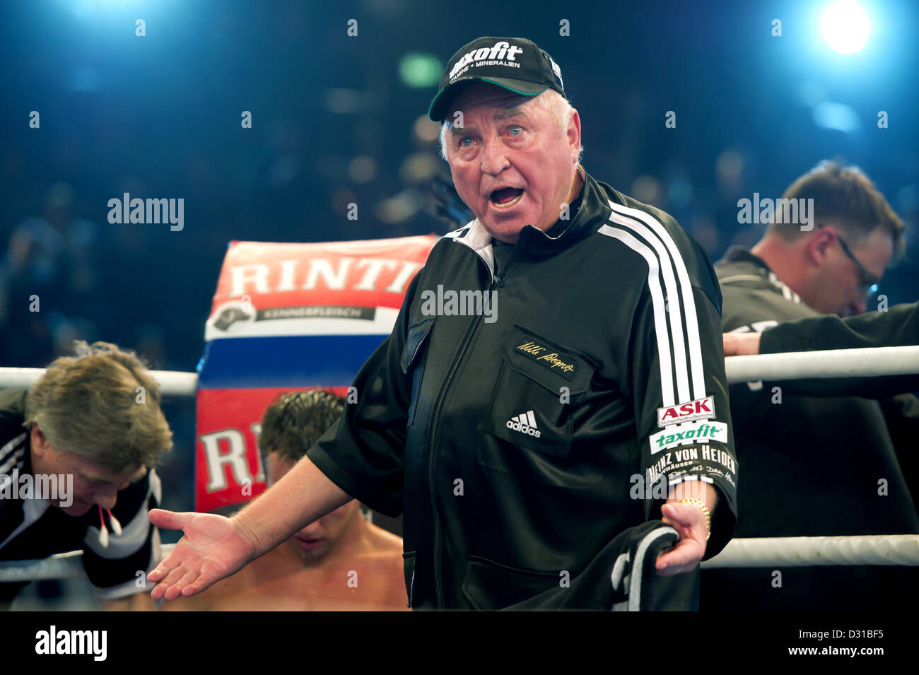Boxing trainer Ulli Wegener gesticulates at the ring during the fight ...