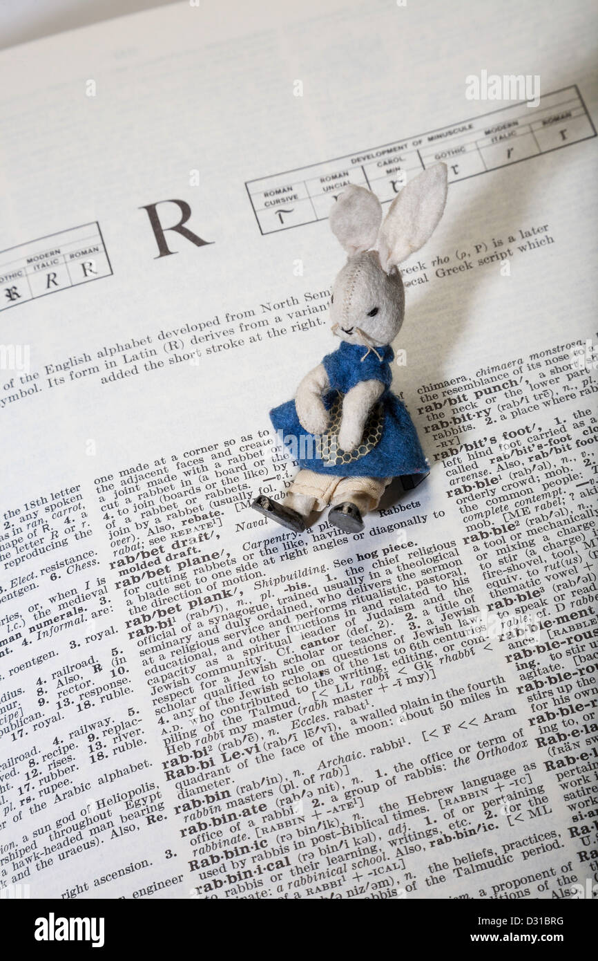 The Letter R In the Dictionary with Toy Rabbit, Still Life Stock Photo ...