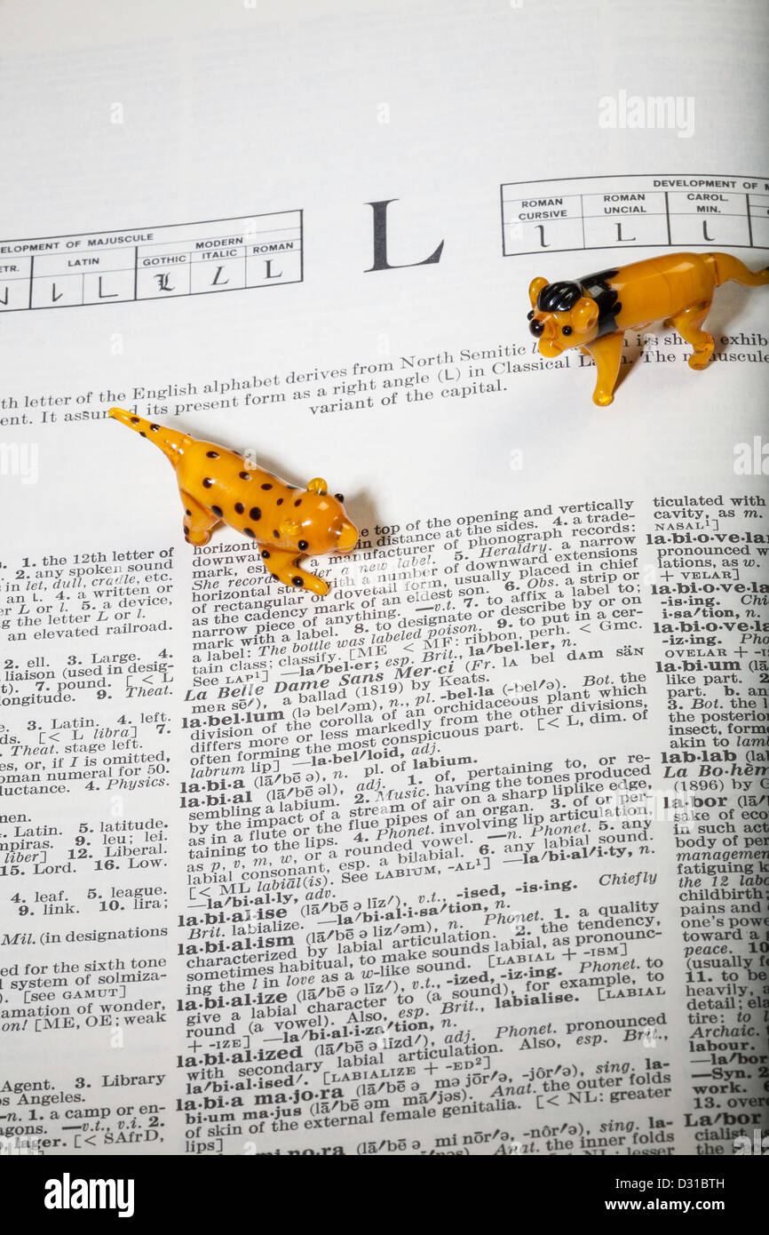 The Letter L In the Dictionary with Toy Lion and Leopard , Still Life ...