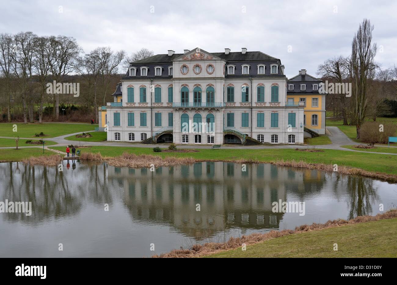 The Rococo-castle Wilhelmsthal reflects in the pond near Calden ...