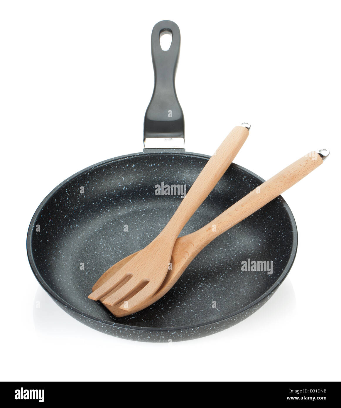 Frying pan with wooden utensils. Isolated on white background Stock ...