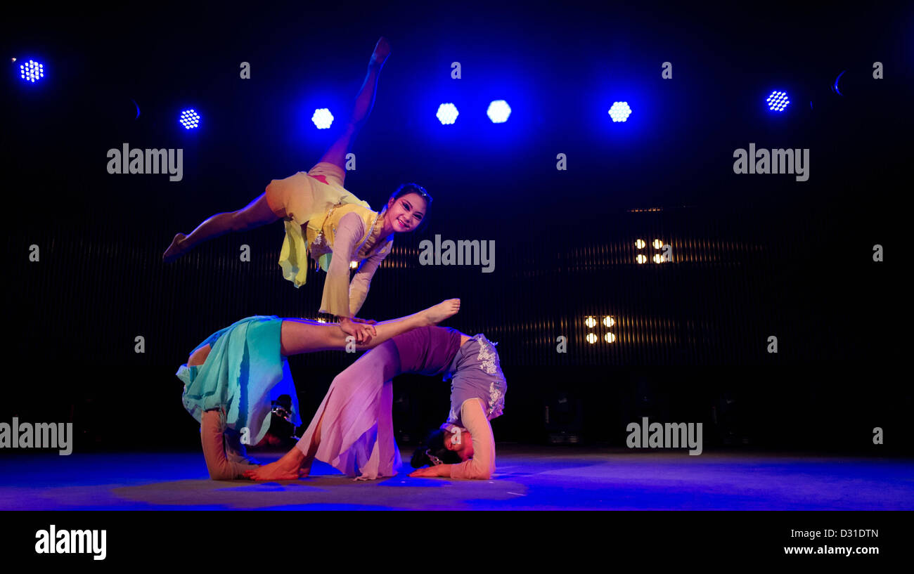 Three chinese acrobats hi-res stock photography and images - Alamy