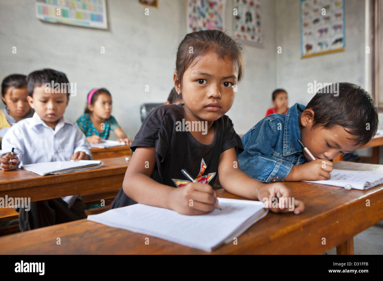 Nepalese nursery school children during a lesson in a classroom at ...