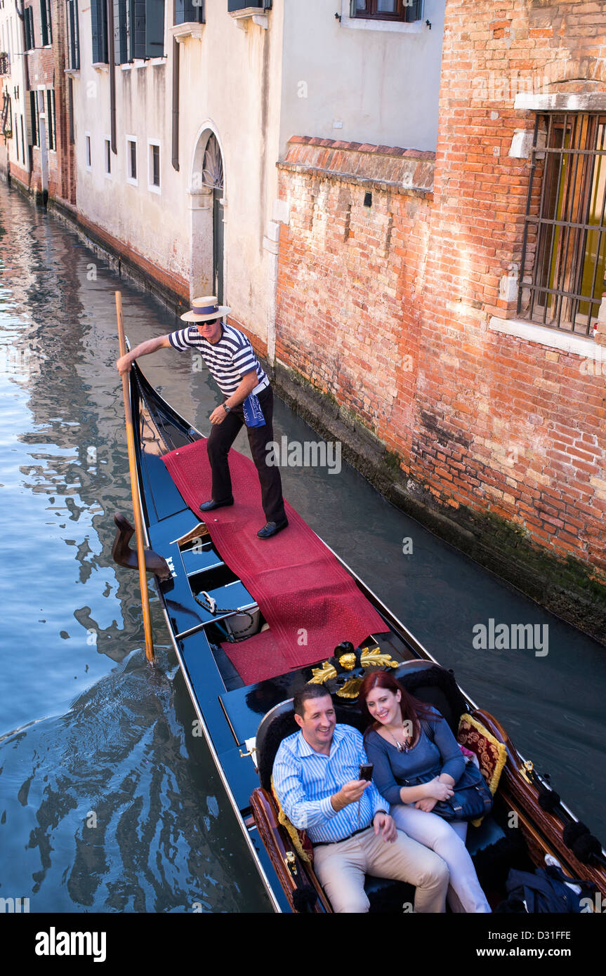Gondolier on Traditional Gondola Venice Stock Photo - Alamy