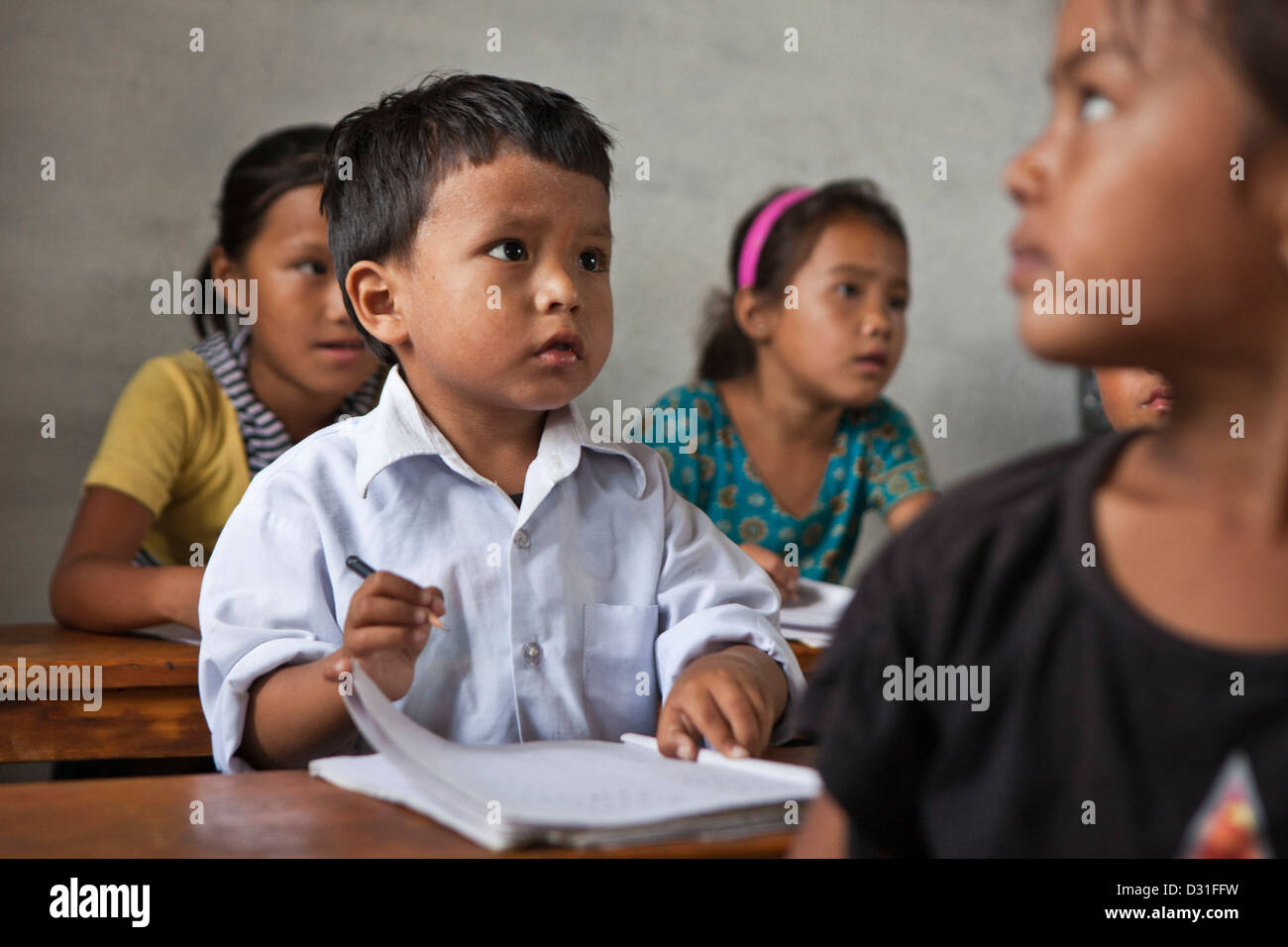 Nepalese nursery school children during a lesson in a classroom at ...