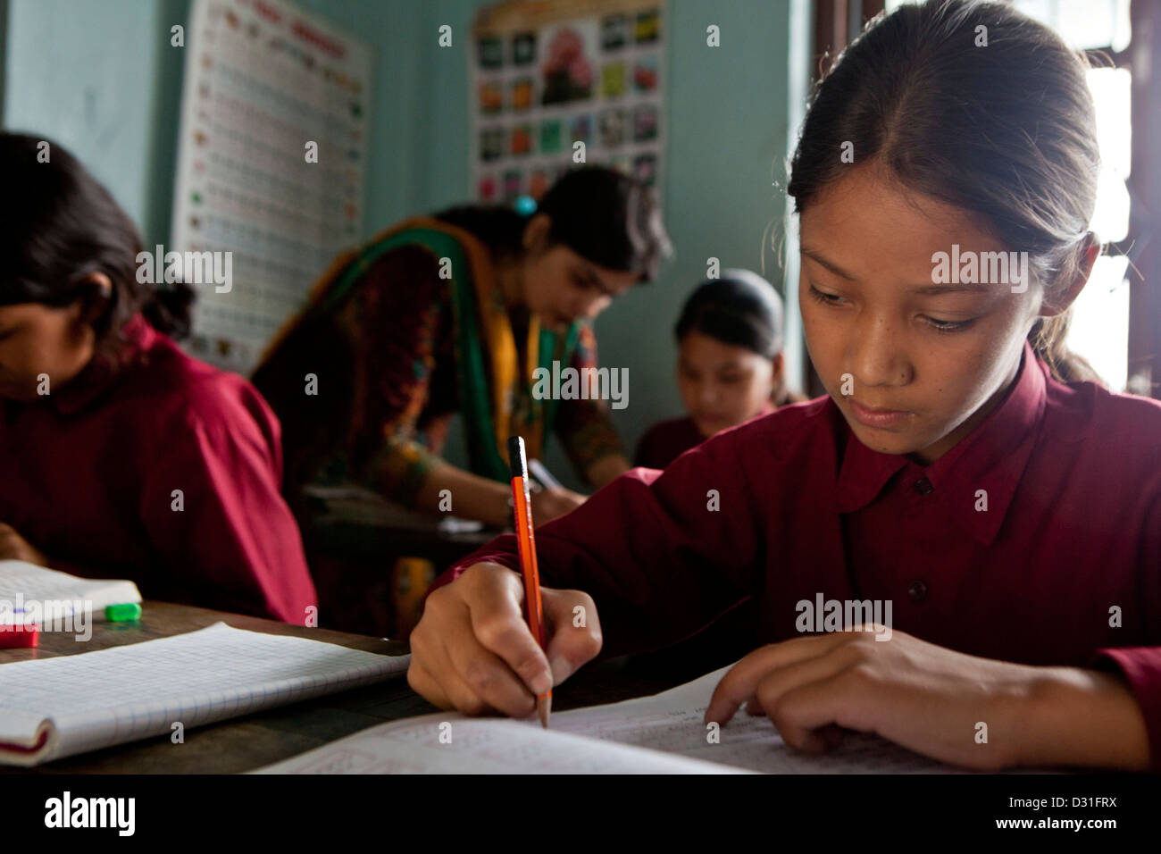 Nepalese school children during a lesson in a classroom at the ...