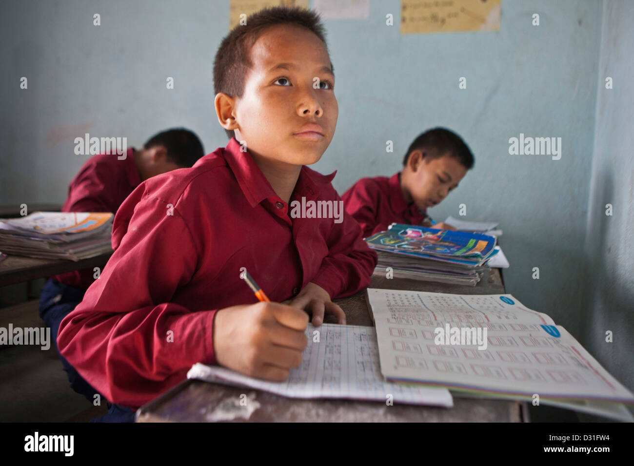 Nepalese school children during a lesson in a classroom at the ...