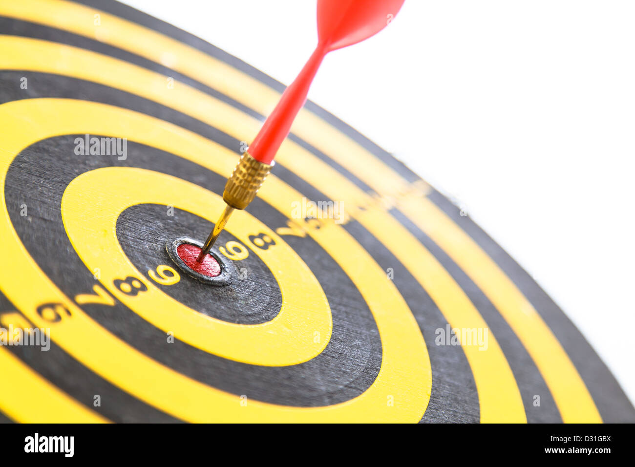 Red dart hitting a target, isolated on white Stock Photo - Alamy
