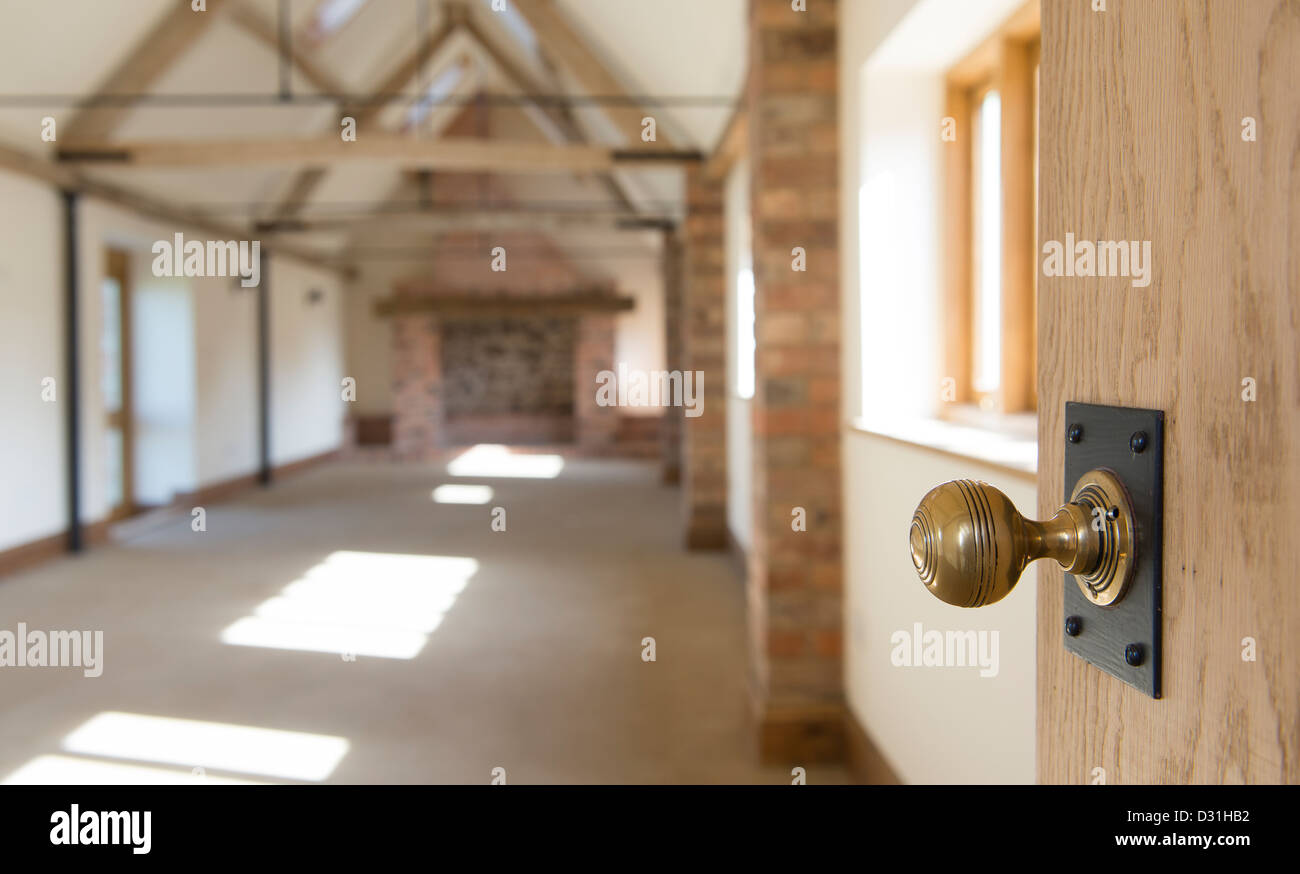 View of an empty room in a barn undergoing conversion Stock Photo - Alamy