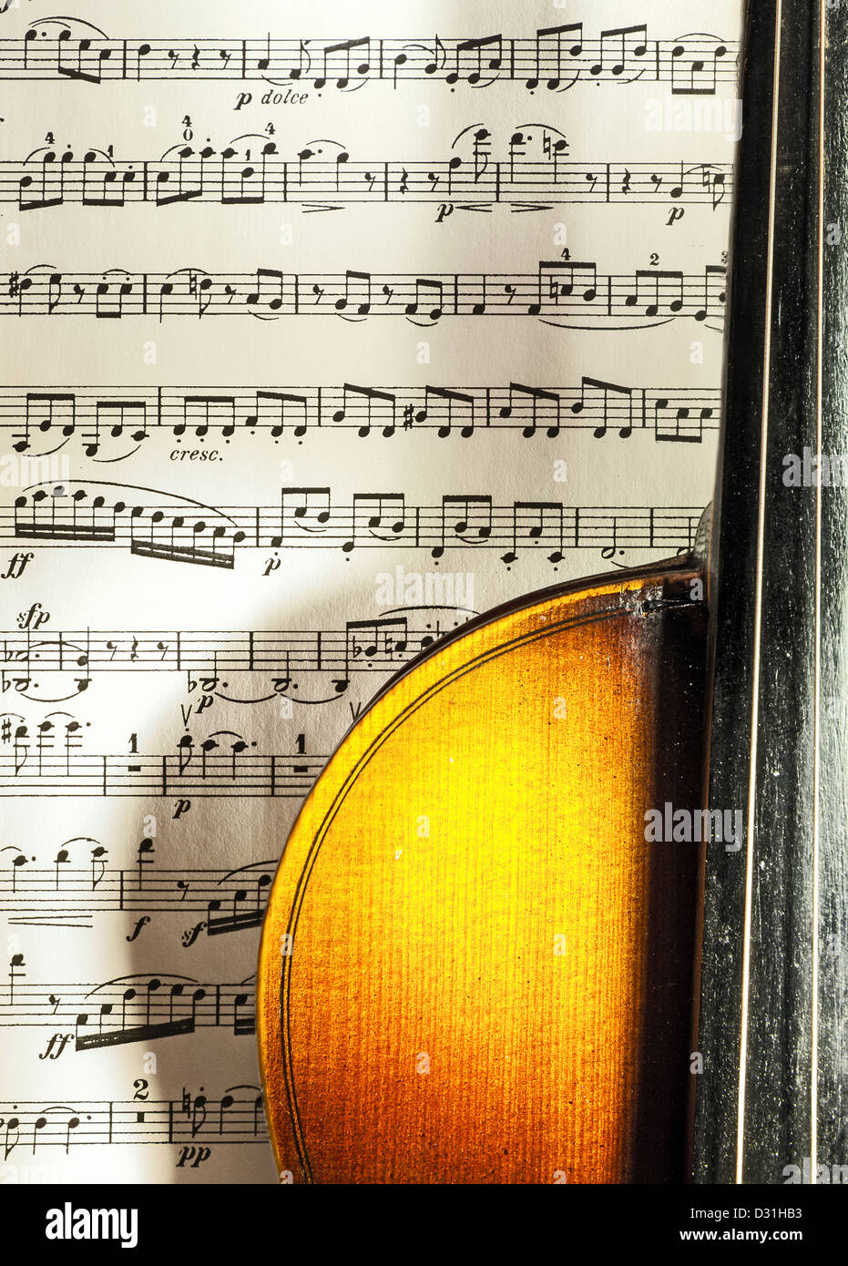 Details of a wooden old dusty violin and scores in background Stock ...
