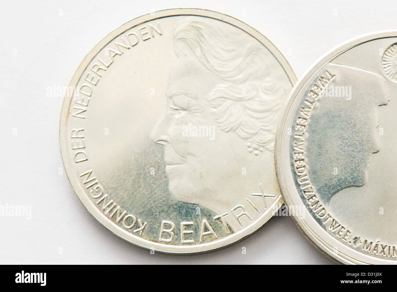 Queen Beatrix and Prince Willem-Alexander are pictured on old Gulden ...