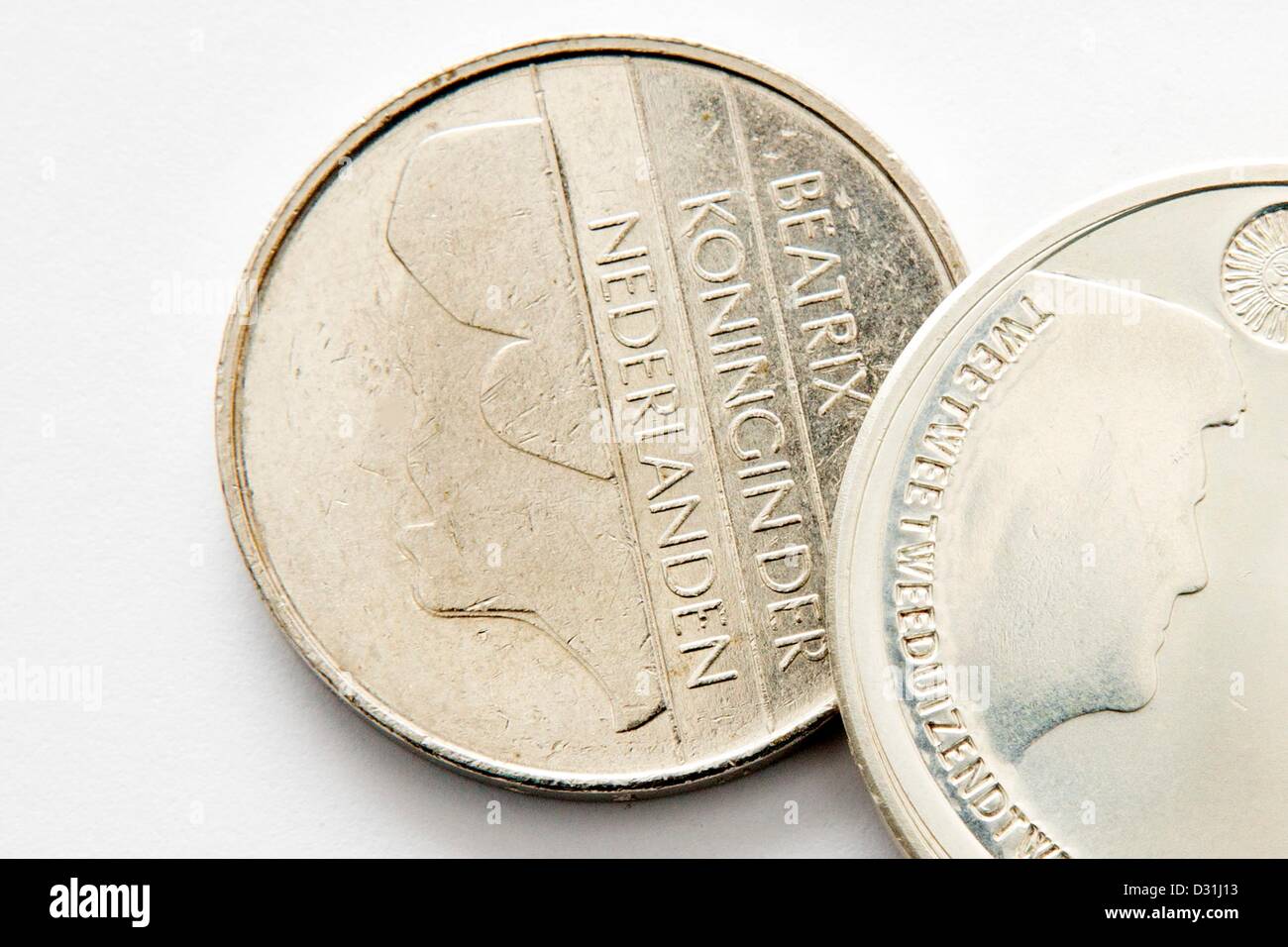 Queen Beatrix and Prince Willem-Alexander are pictured on old Gulden ...